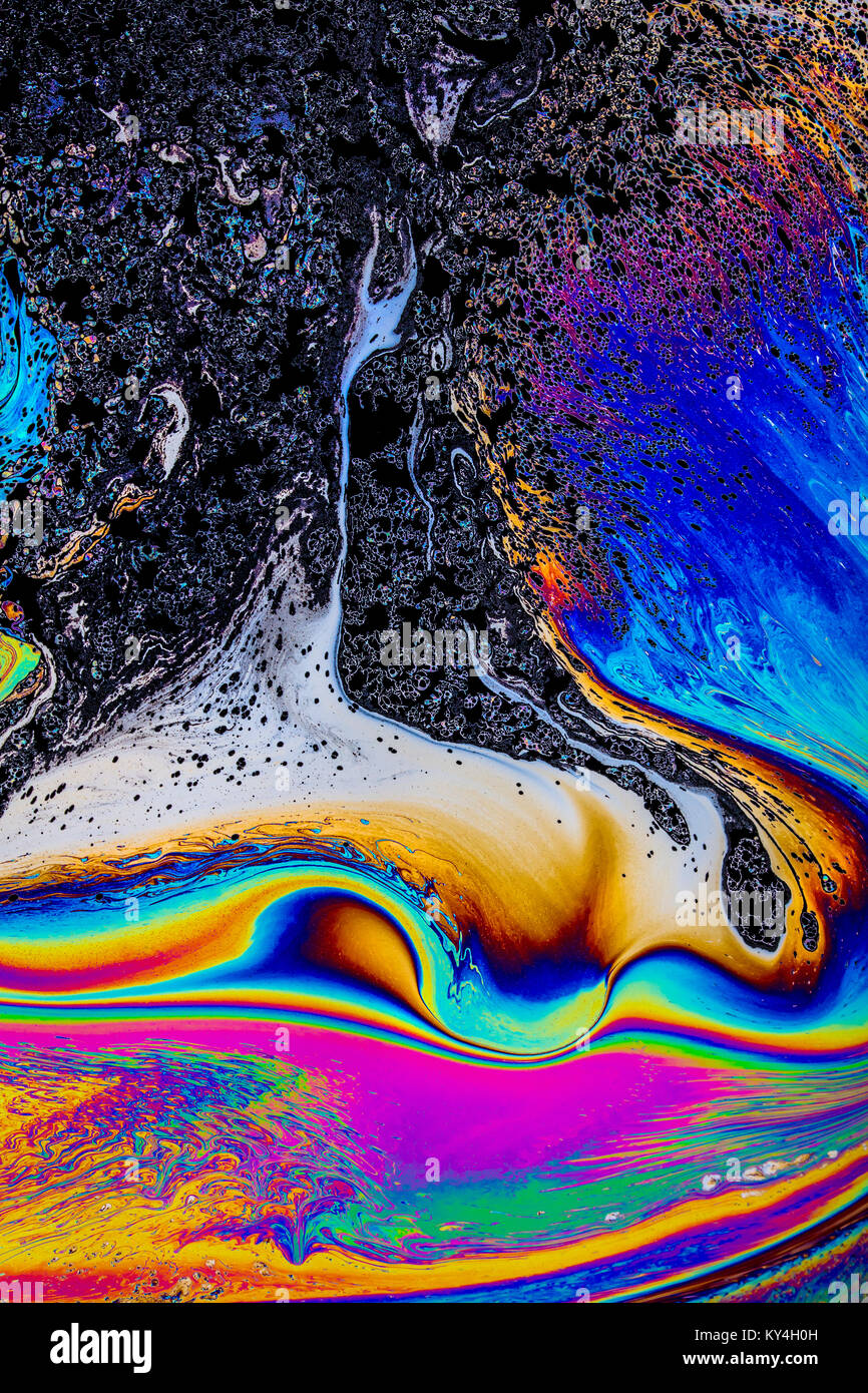 Optical thin film interference patterns in a stretched soap solution ...