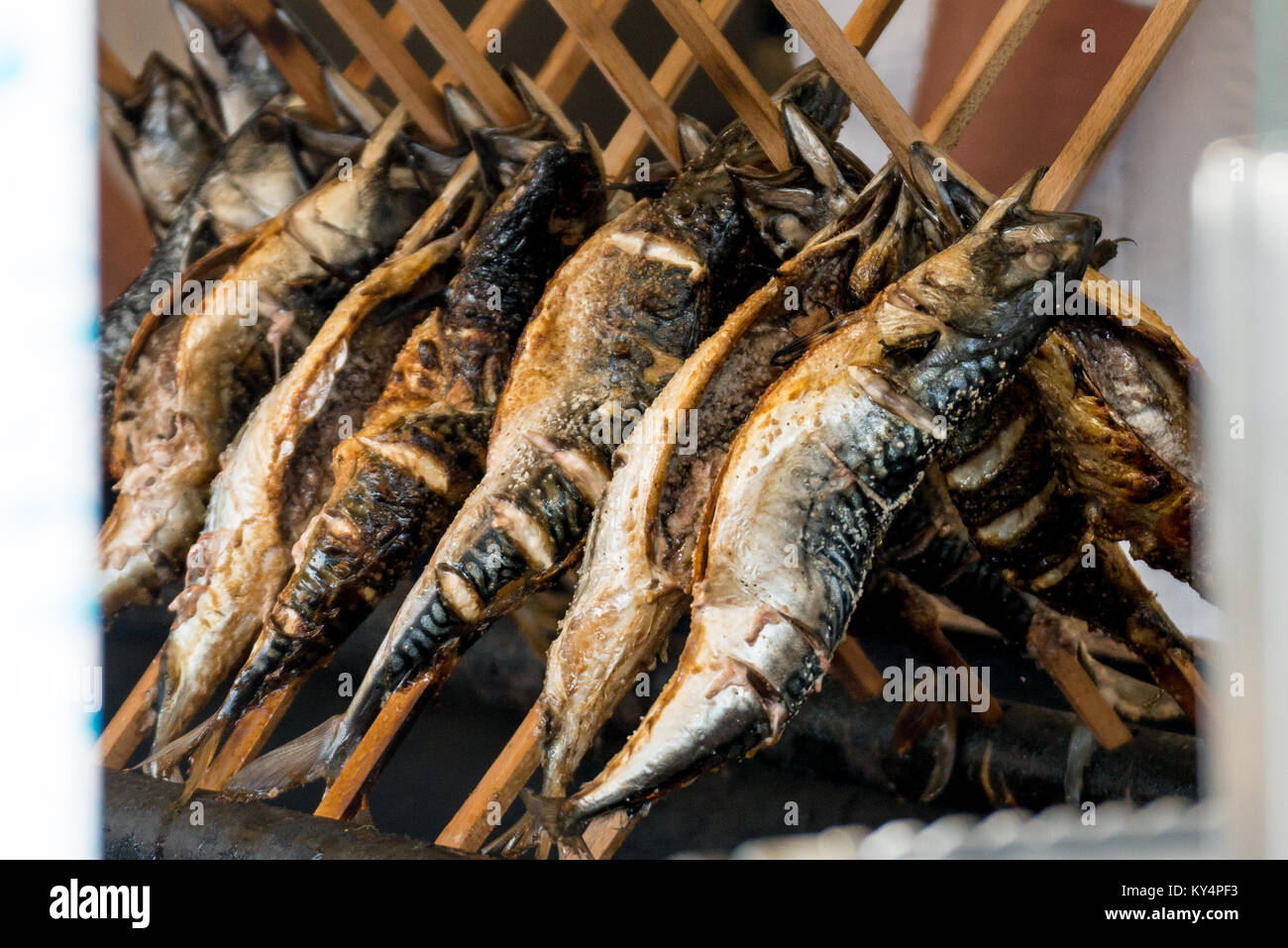 Fried fish on a stick at folk festival, Germany Stock Photo - Alamy