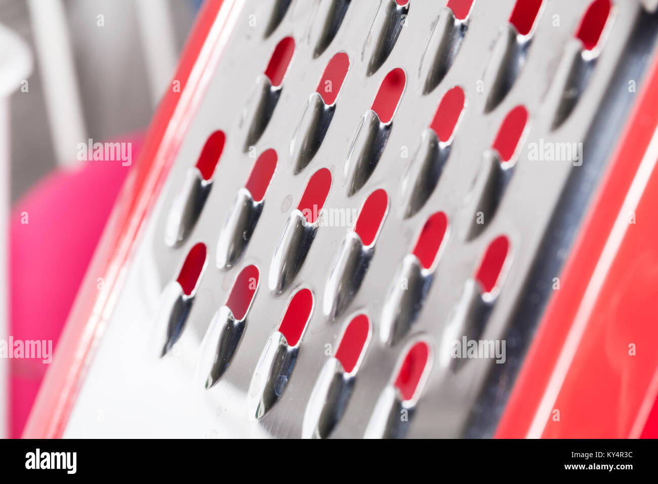 Closeup of cheese grater Stock Photo - Alamy