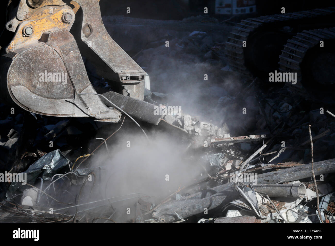 Excavator bucket in action Stock Photo - Alamy