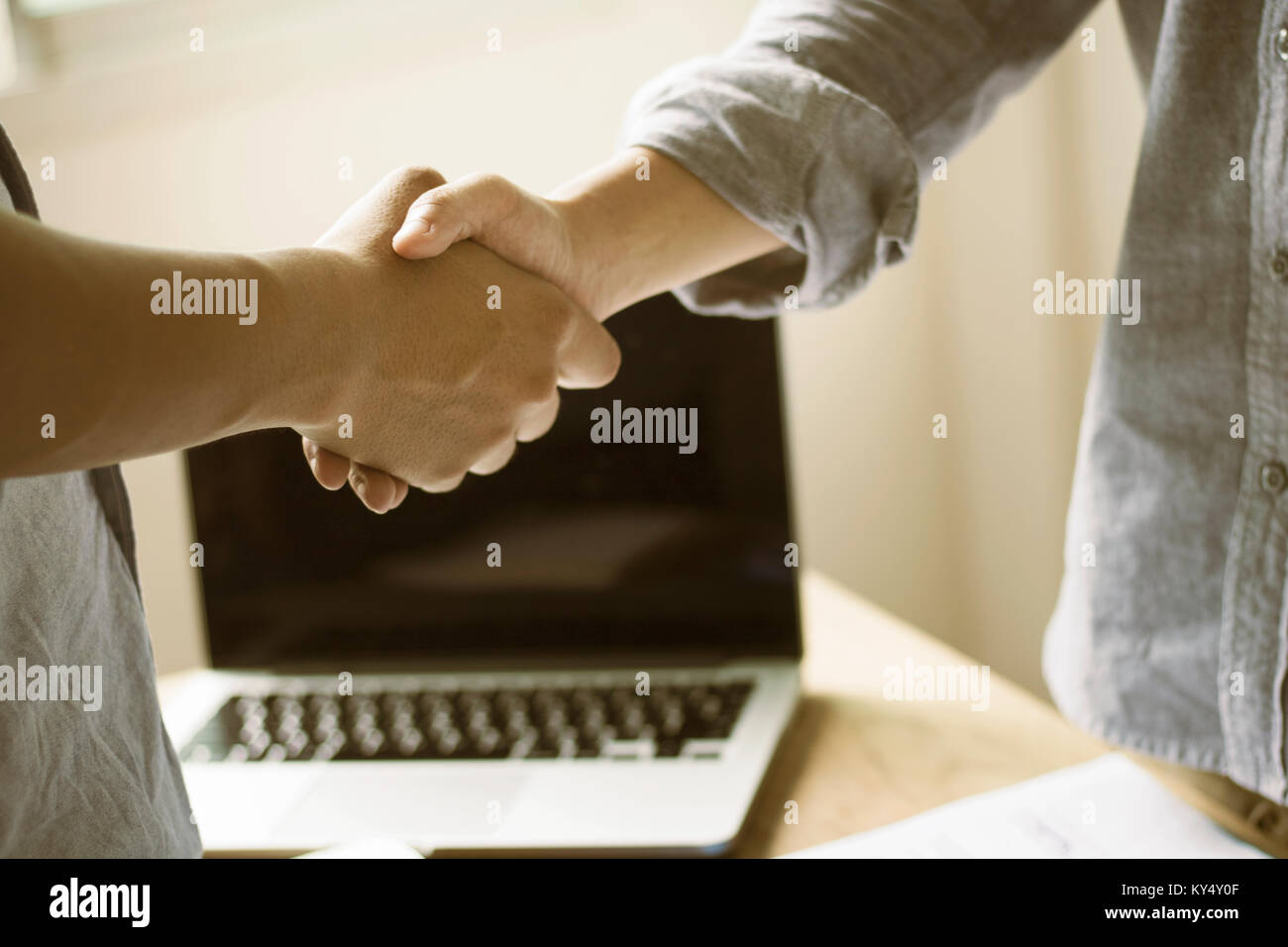 businessman shaking hand in working place or office, concept as ...