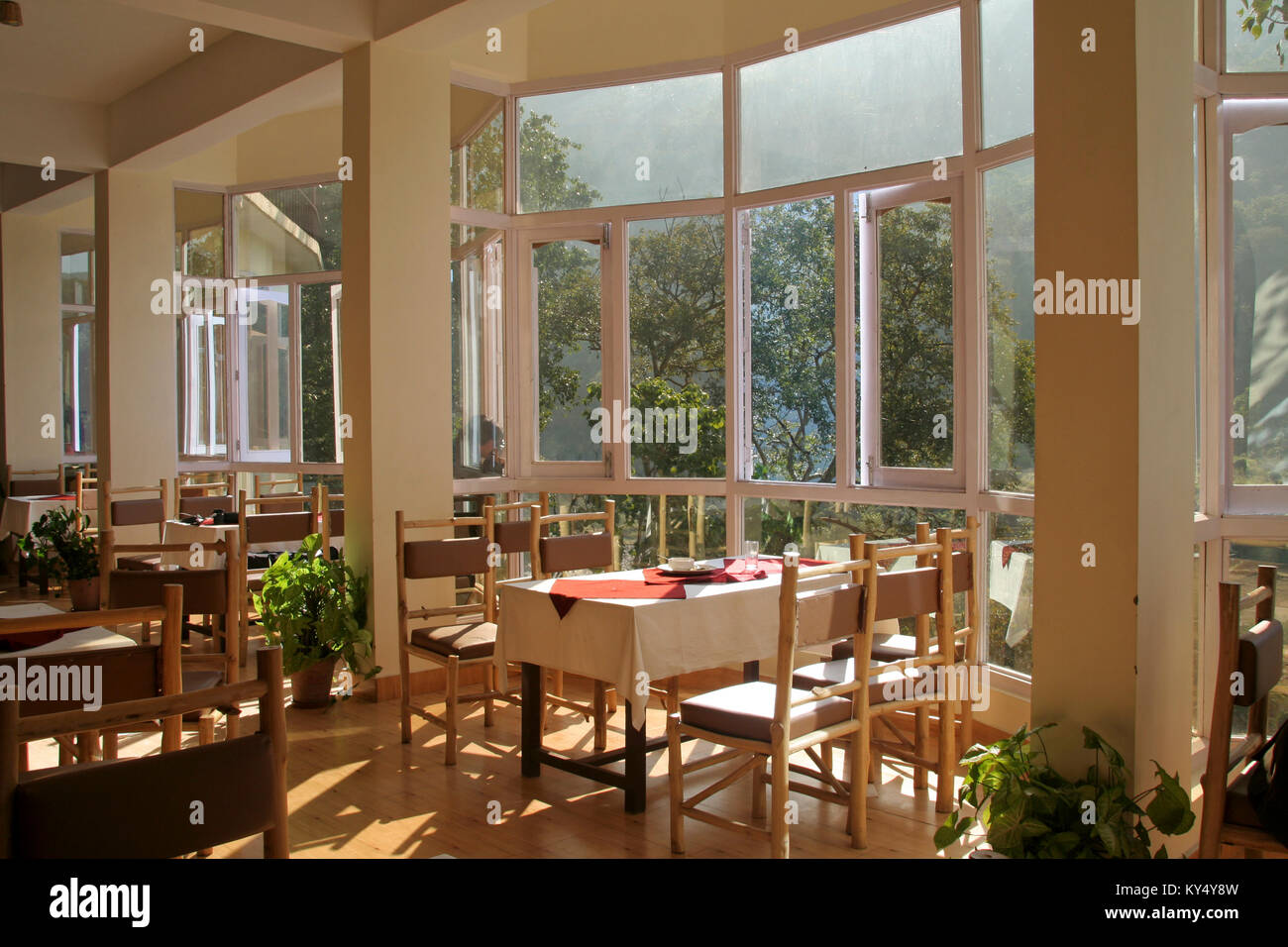 View of dining hall in a restaurant with glass windows to enjoy ...