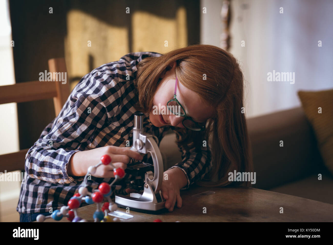 Girl microscope hi-res stock photography and images - Alamy