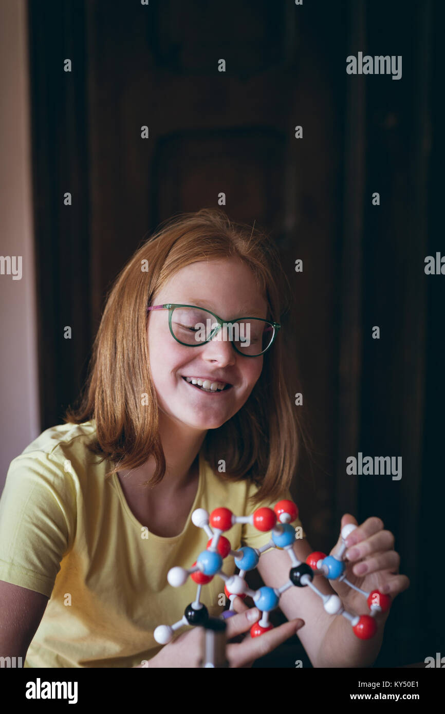 Girl experimenting with molecule Stock Photo - Alamy