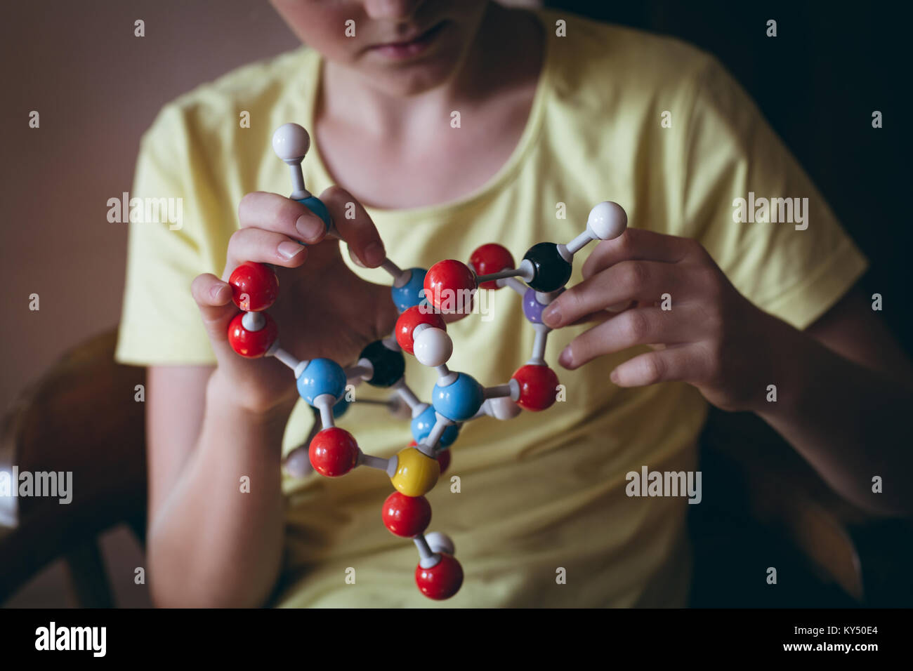 Girl experimenting with molecule Stock Photo - Alamy