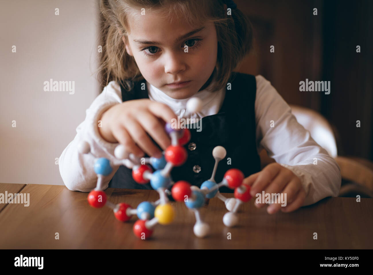 Girl experimenting with molecule Stock Photo - Alamy