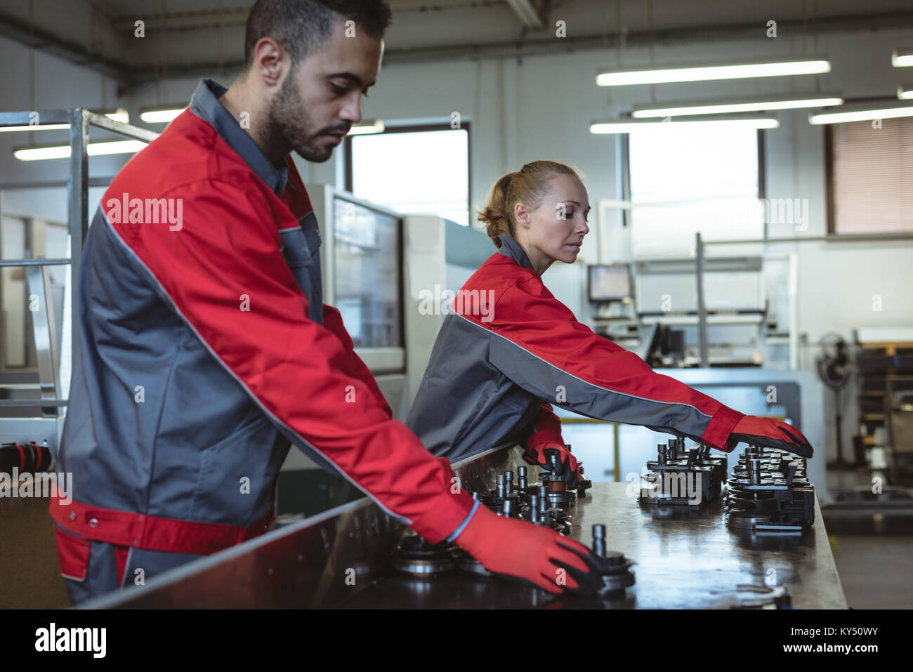 Checking machine parts hi-res stock photography and images - Alamy