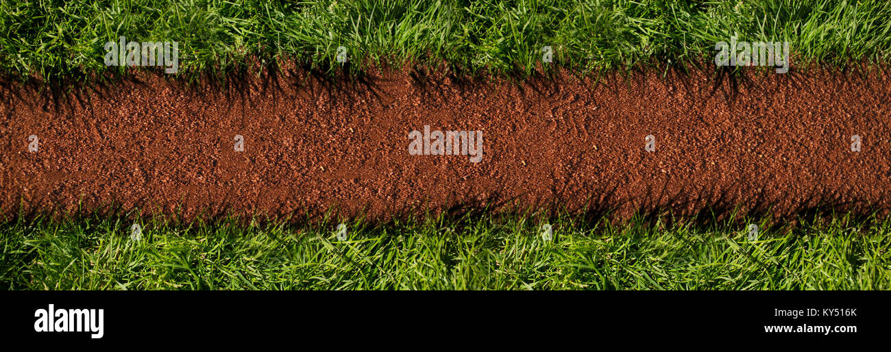 Composite image of line running through the grass Stock Photo - Alamy