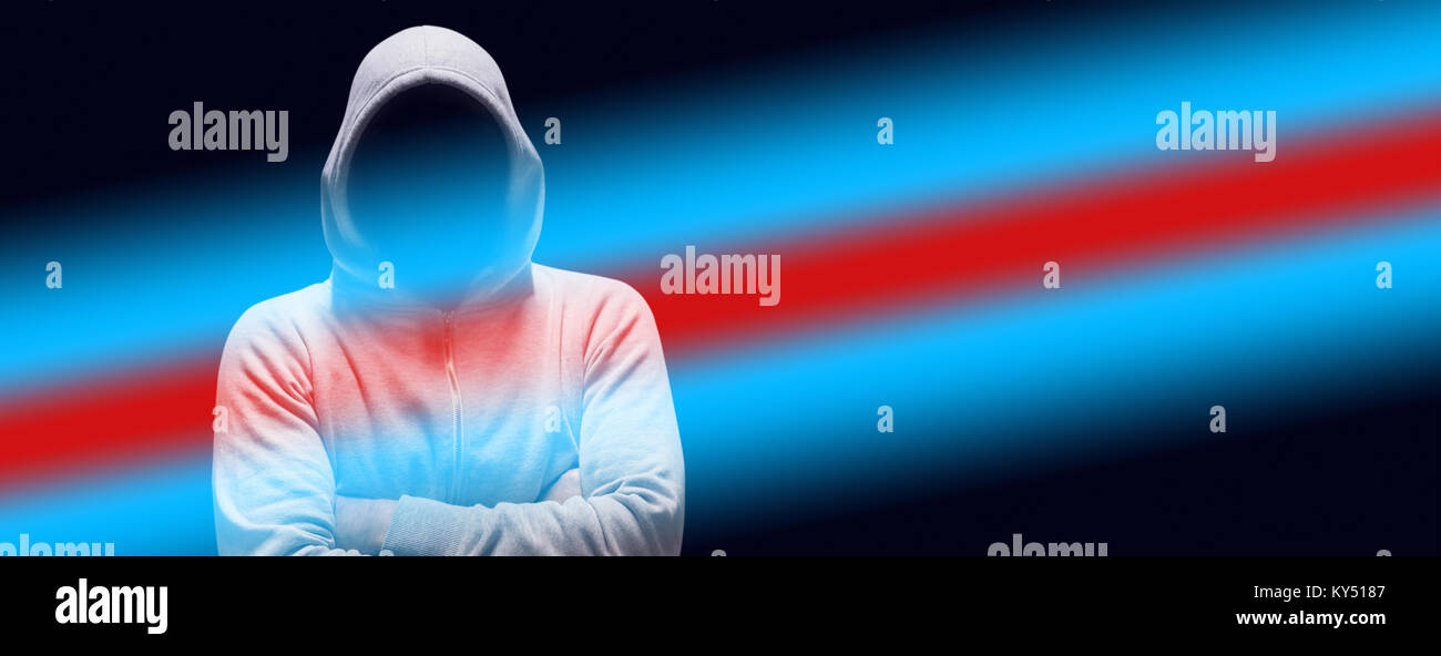 Hacker standing with arms crossed Stock Photo - Alamy