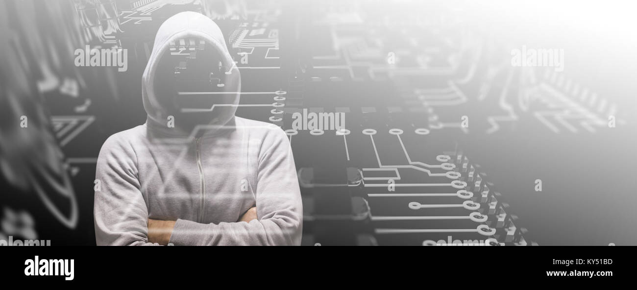 Composite image of hacker standing with arms crossed Stock Photo - Alamy