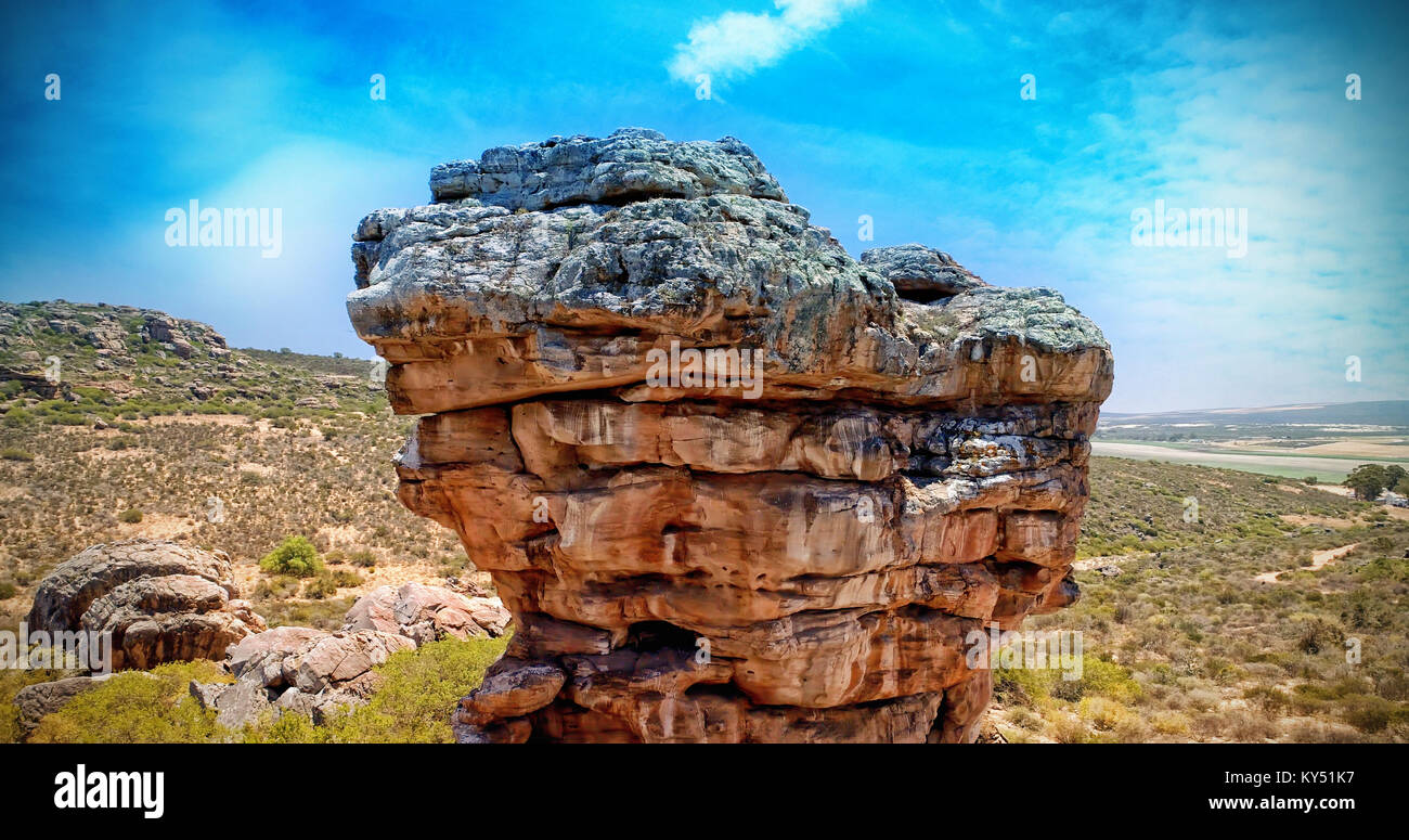 Big rock with landscape behind Stock Photo - Alamy