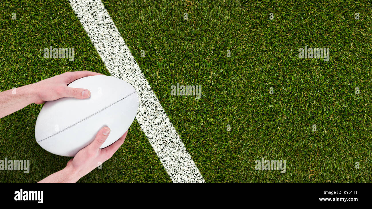 Composite image of rugby player catching a rugby ball Stock Photo - Alamy