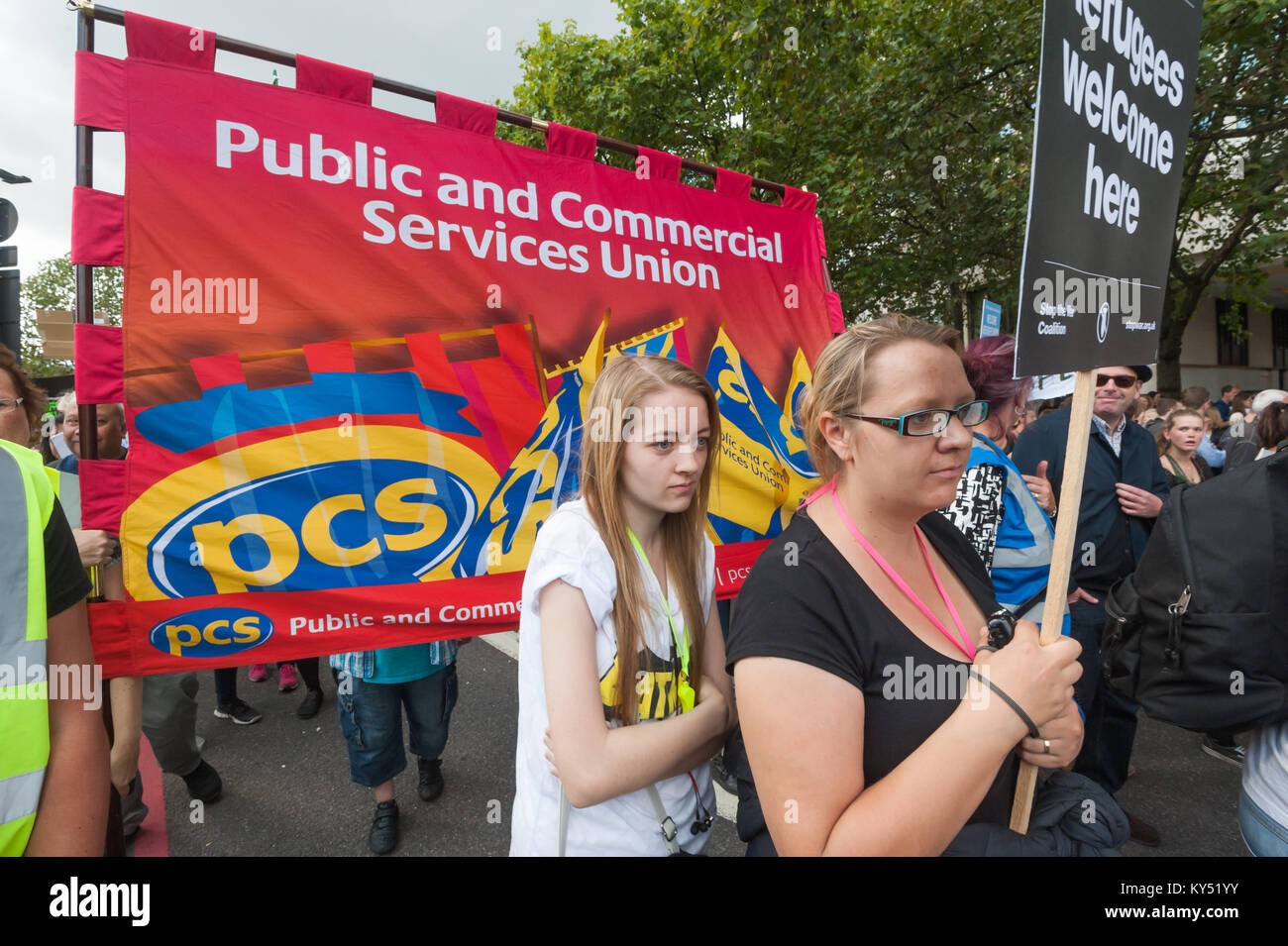 The Public and Commercial Services Union (PCS) banner on the 'Refugees ...