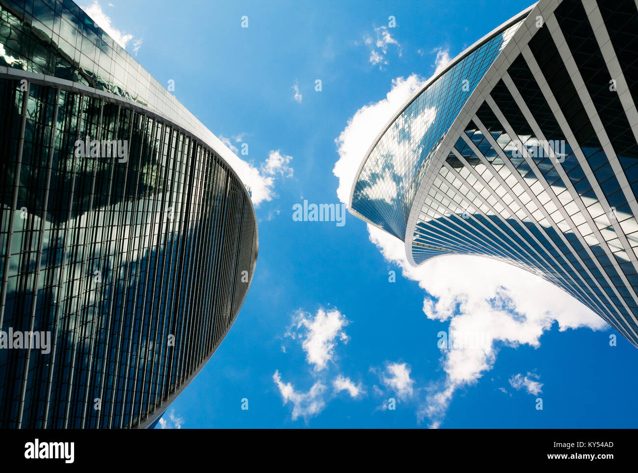 Two large towers of a skyscraper on a background of a beautiful sky ...
