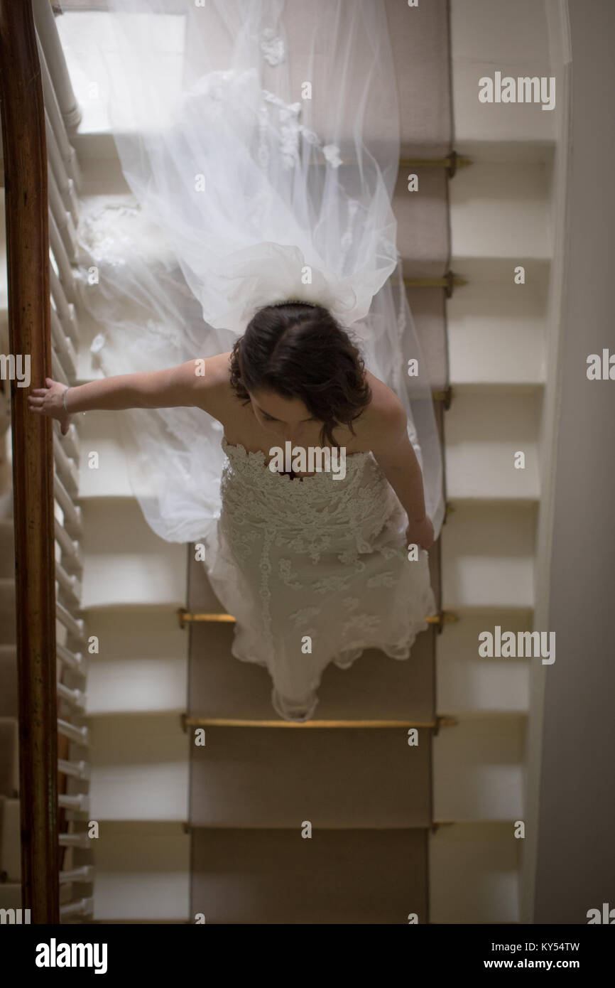 bride walking down the steps at home Stock Photo - Alamy