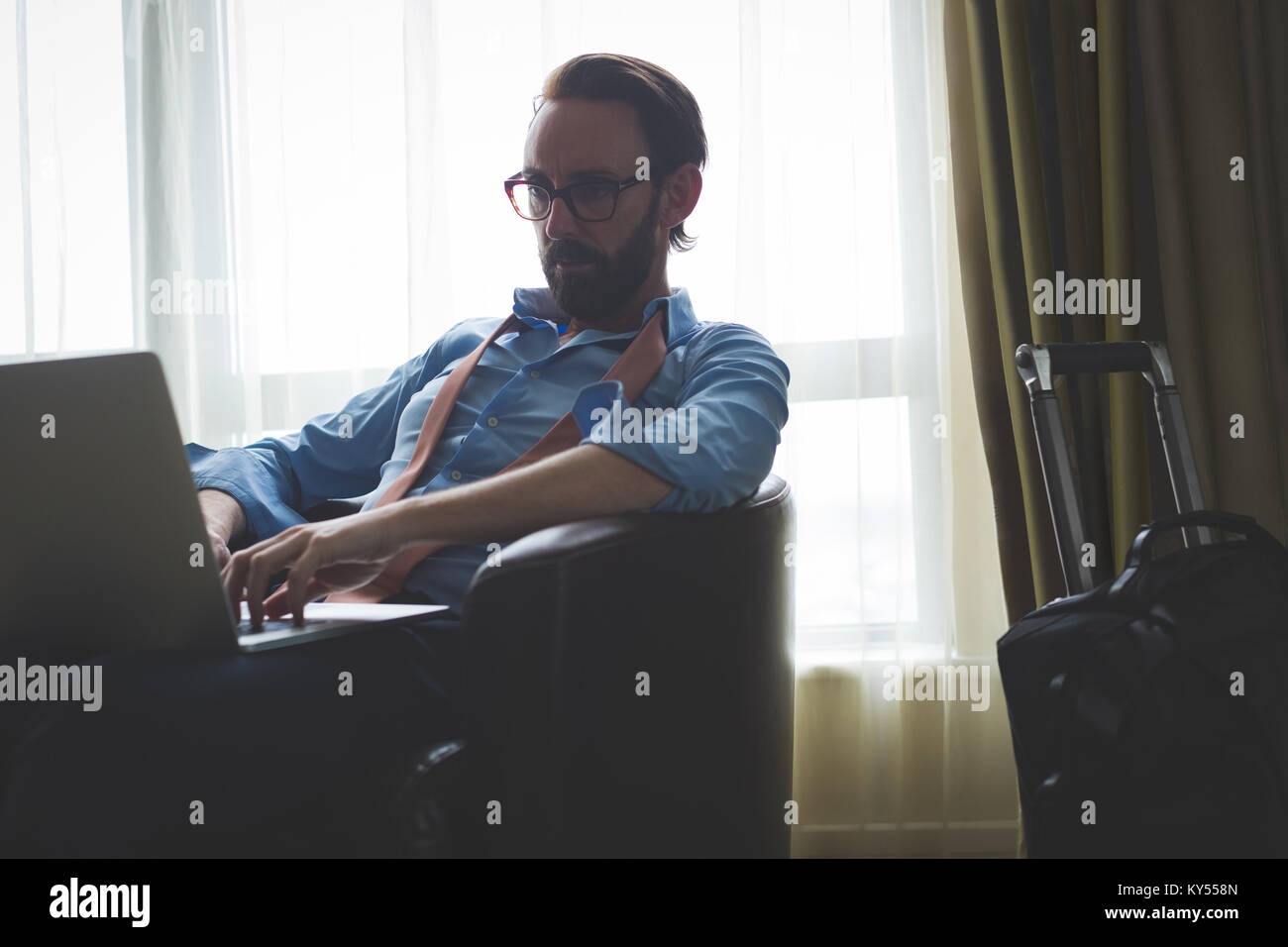 Computer on chair arm hi-res stock photography and images - Alamy