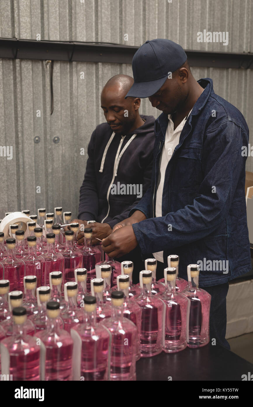 Distillery workers hi-res stock photography and images - Alamy
