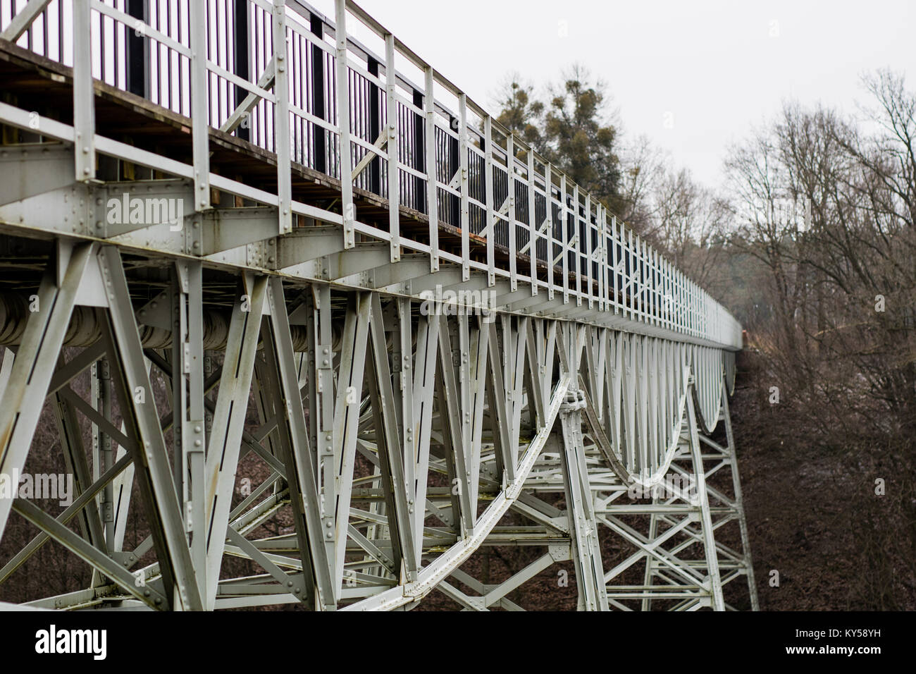 A bridge over a river built from a truss. Bridge, truss joined by ...