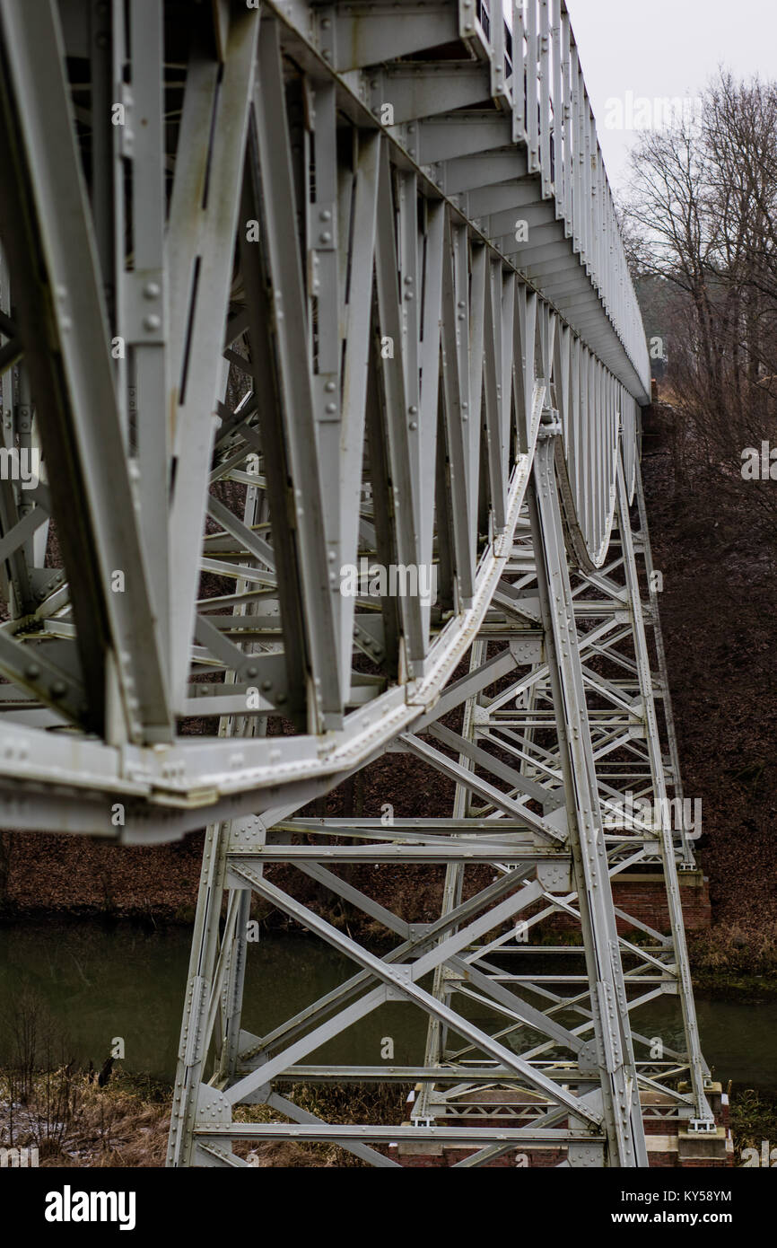 A bridge over a river built from a truss. Bridge, truss joined by ...