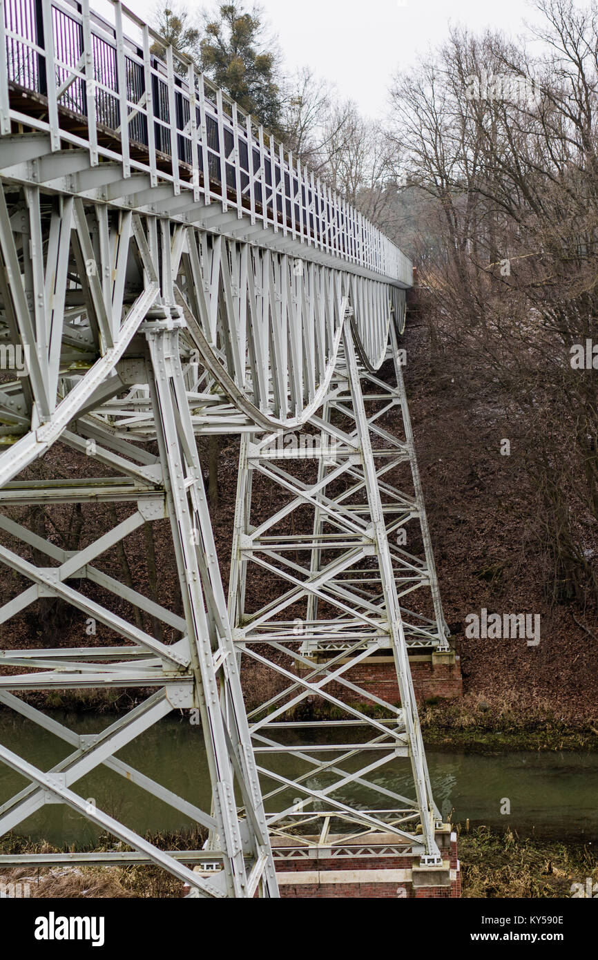 A bridge over a river built from a truss. Bridge, truss joined by ...