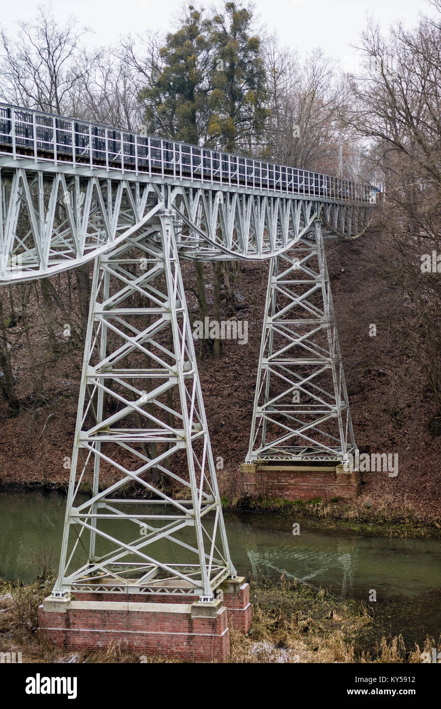 A bridge over a river built from a truss. Bridge, truss joined by ...