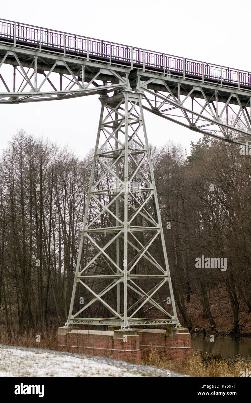 A bridge over a river built from a truss. Bridge, truss joined by ...