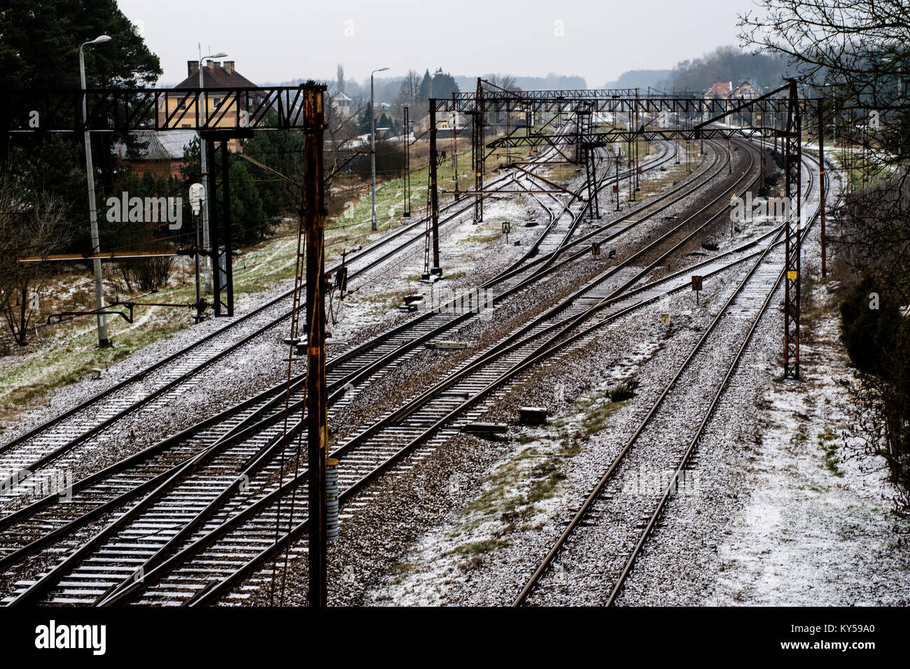 Old track at the railway station. Winter scenery of railway tracks with ...