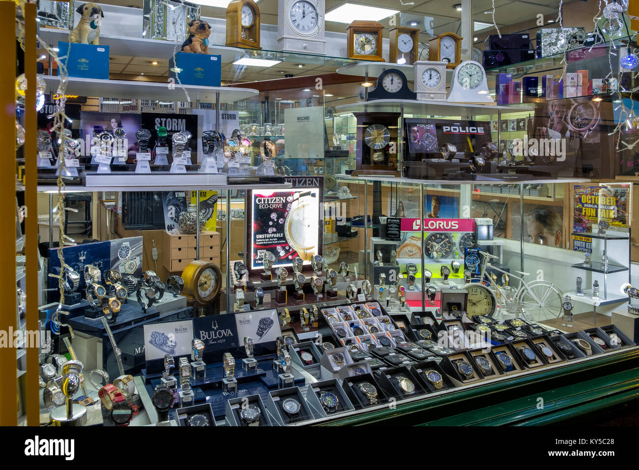 Watches in shop window in Glasgow Stock Photo - Alamy