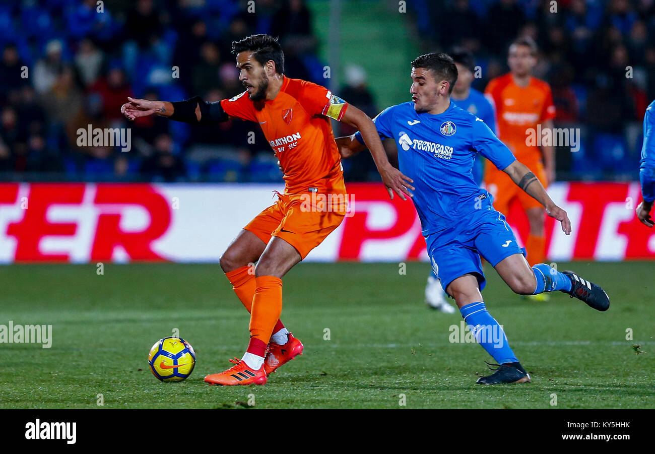 Football players Arrambarri and Recio during La Liga match between ...