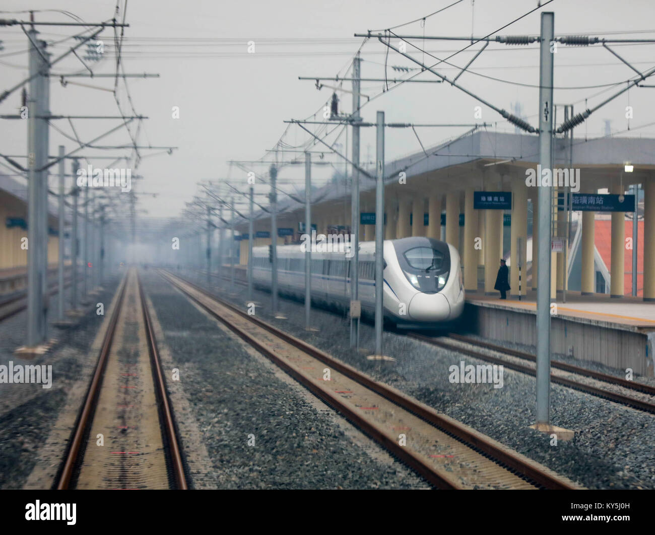 Chongqing. 12th Jan, 2018. A bullet train is seen at Luohuang South ...