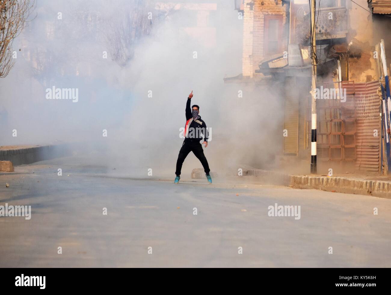 Srinagar, Kashmir . 13th Jan, 2018. A Kashmiri protester shout pro ...
