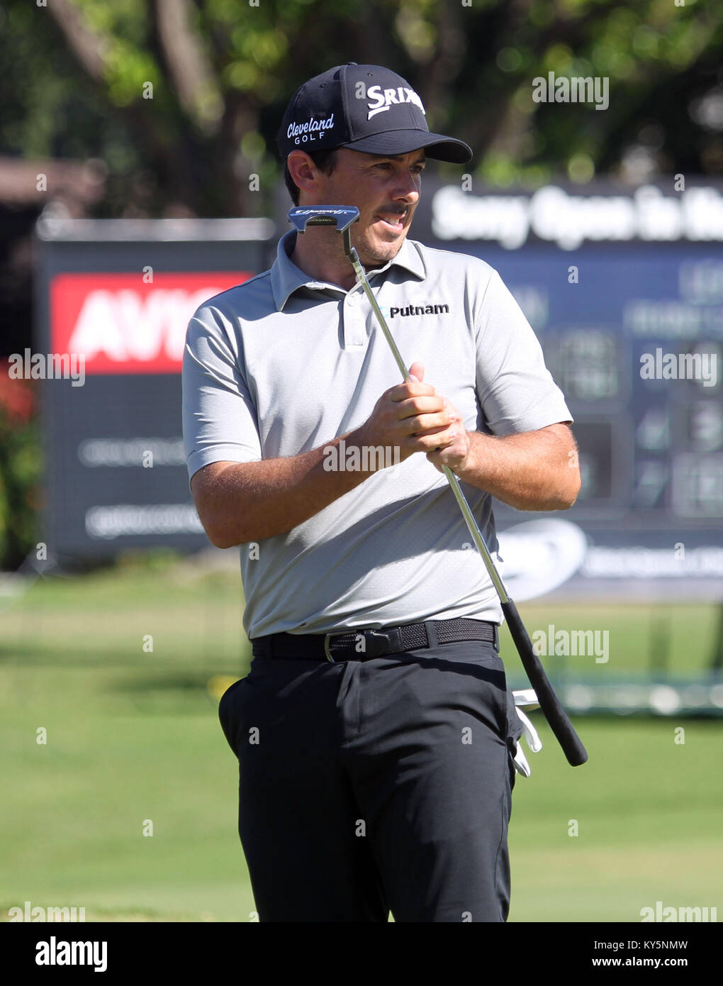 Honolulu, Hawaii. January 12, 2018 - Jon Curran assesses the 18th green ...