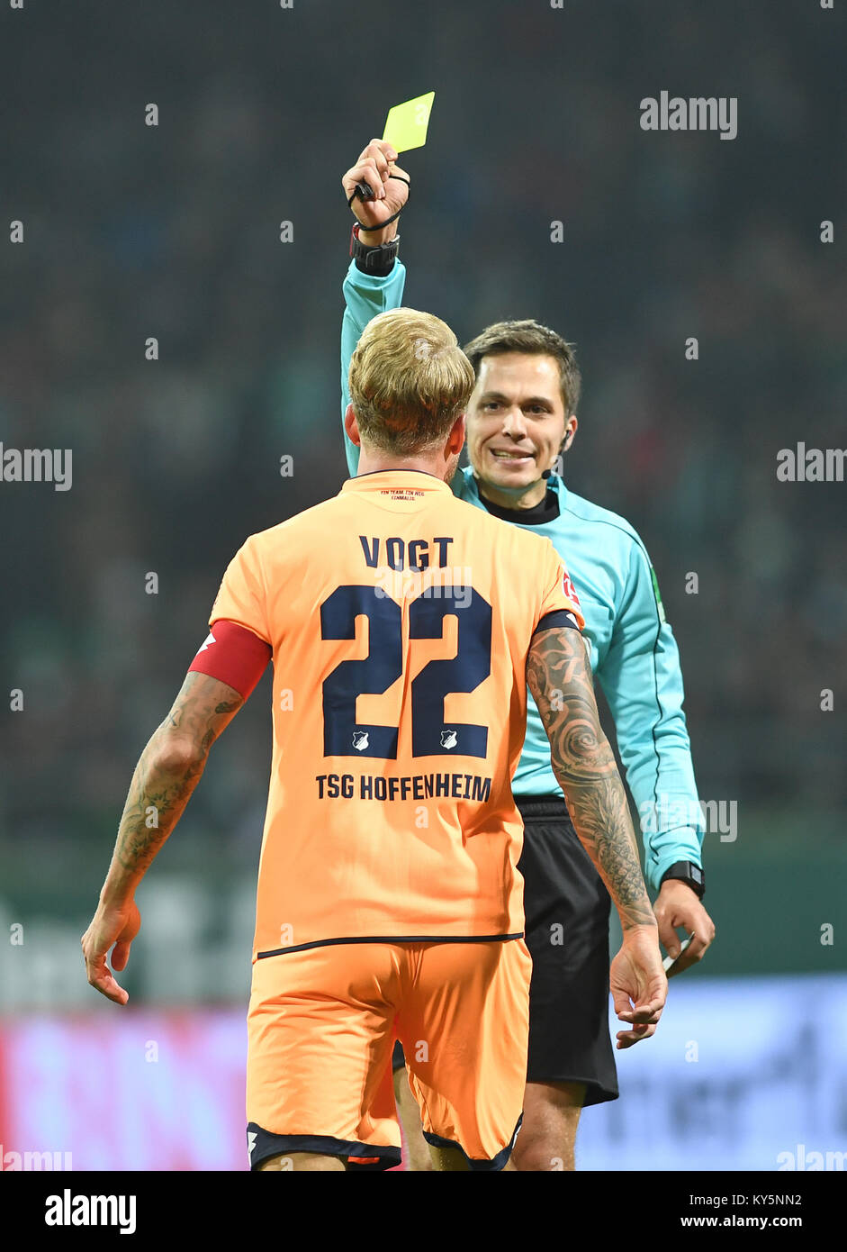 Bremen, Germany. 13th Jan, 2018. Referee Robert Hartmann shows ...