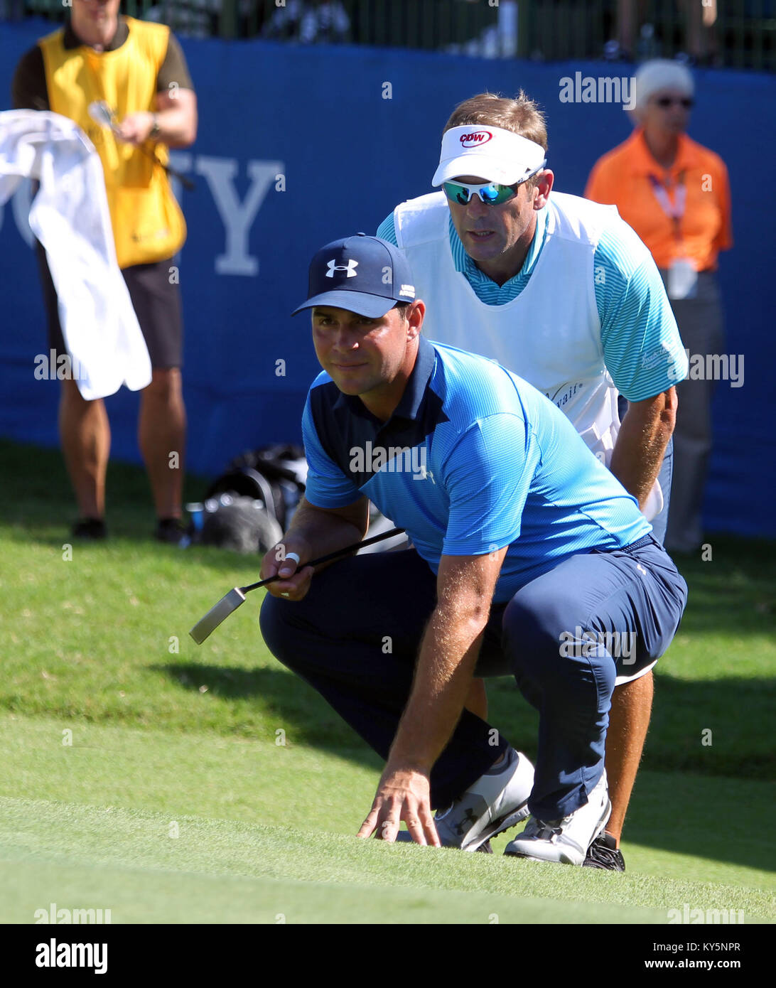 Honolulu, Hawaii. January 12, 2018 - Gary Woodland gets a little input ...