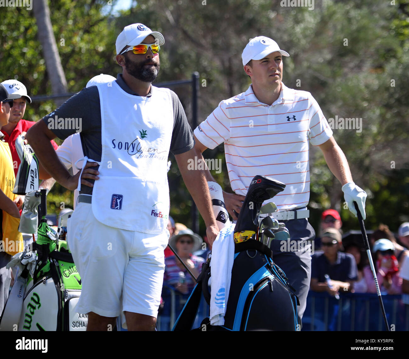 January 12, 2018 - Jordan Spieth and his caddy await their tee time at ...
