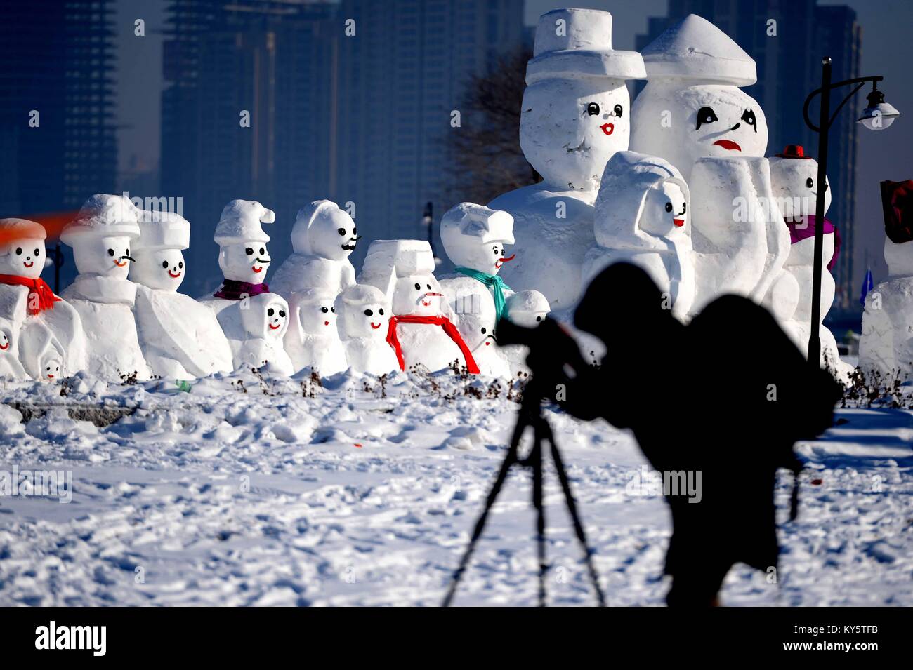 Beijing, China's Heilongjiang Province. 11th Jan, 2018. A photographer ...
