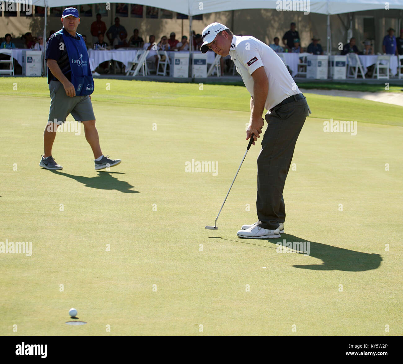 January 13, 2018 - Leader into the clubhouse, Tom Hoge putts on the 9th ...