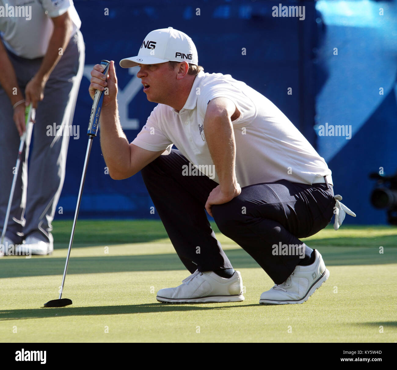January 13, 2018 - Ryan Palmer lines up his putt on the 18th hole ...