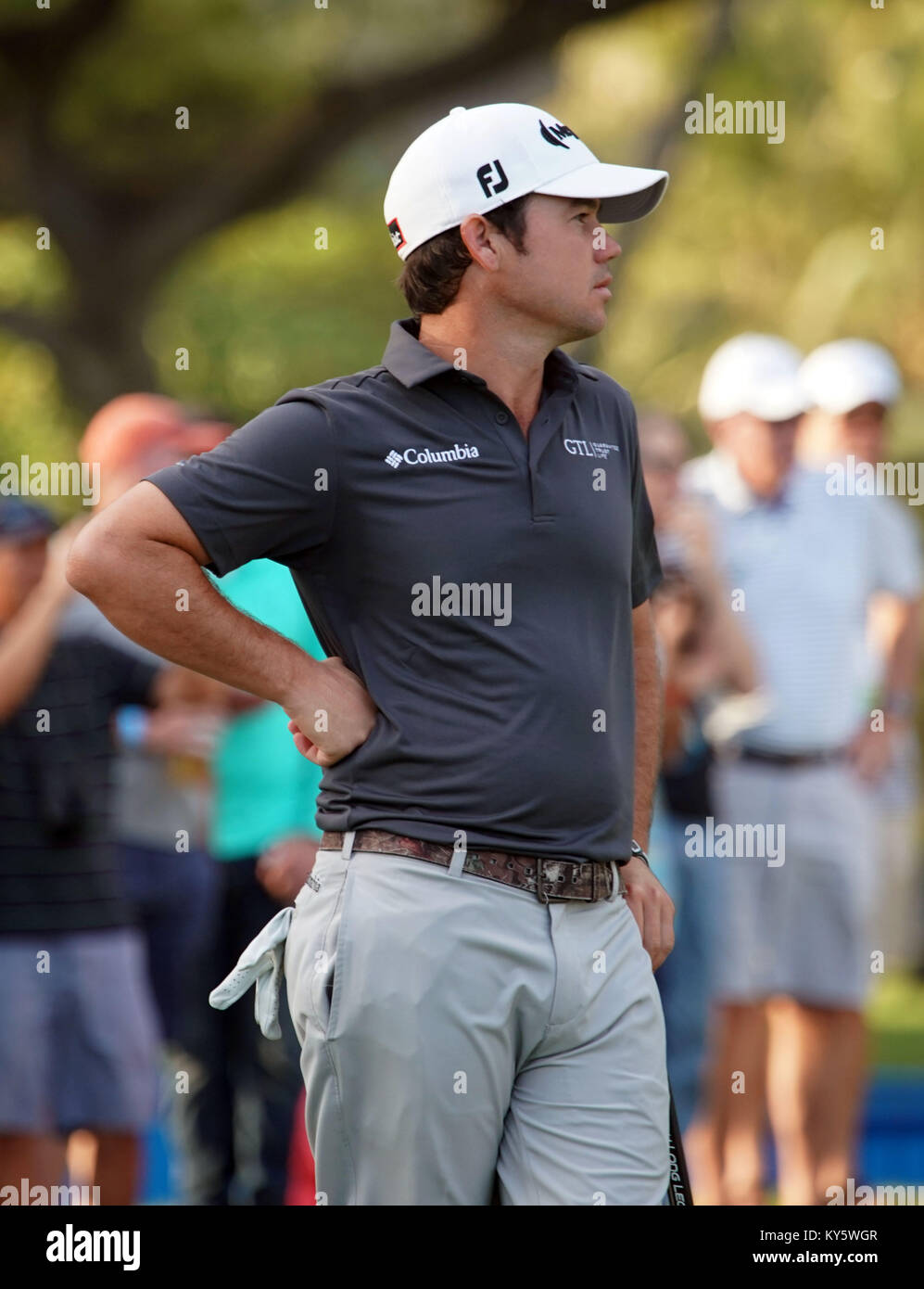 January 13, 2018 - Brian Harmon waits to putt on the 17th hole during ...
