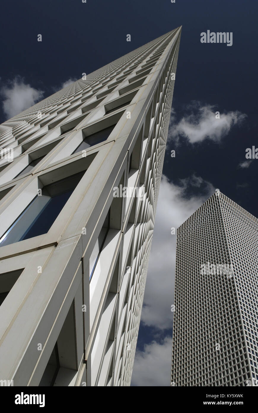 Abstract distorted proportions art photo of a white skyscrapers on a ...