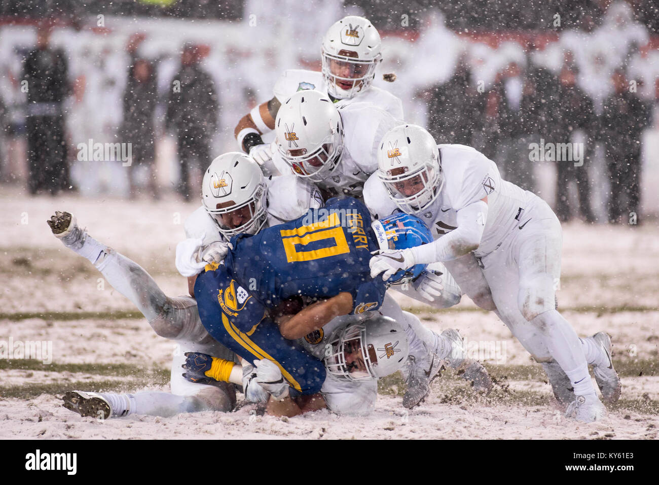 U.S. Military Academy football players tackle U.S. Naval Academy ...
