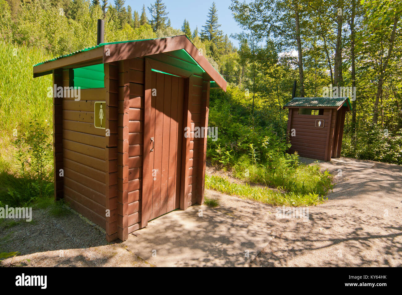 Small wooden huts for toilets located in the wilderness Stock Photo - Alamy