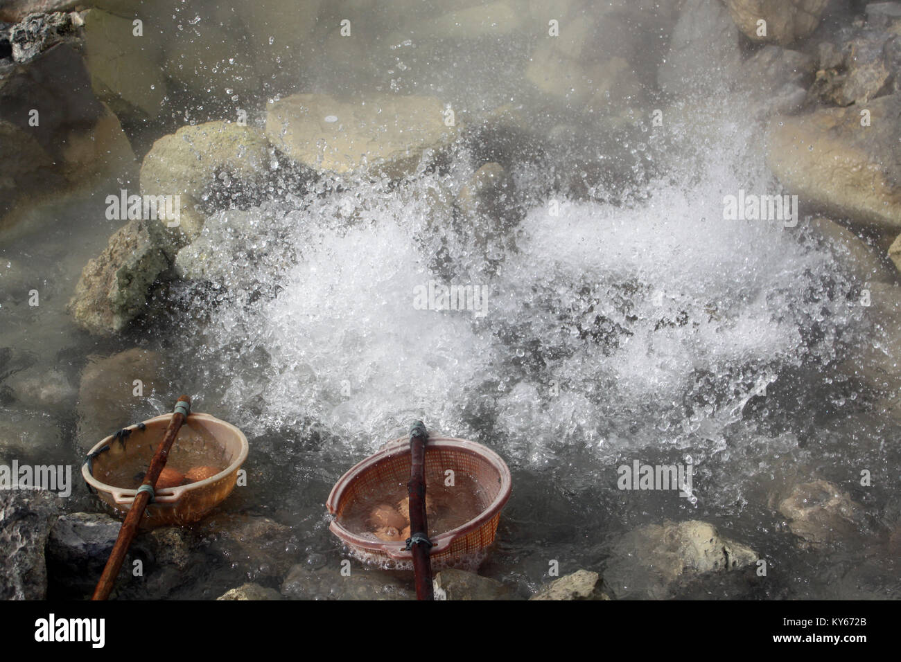 Boiling eggs in hot springs in volcano Tangkuban Perahu in Indonesia ...