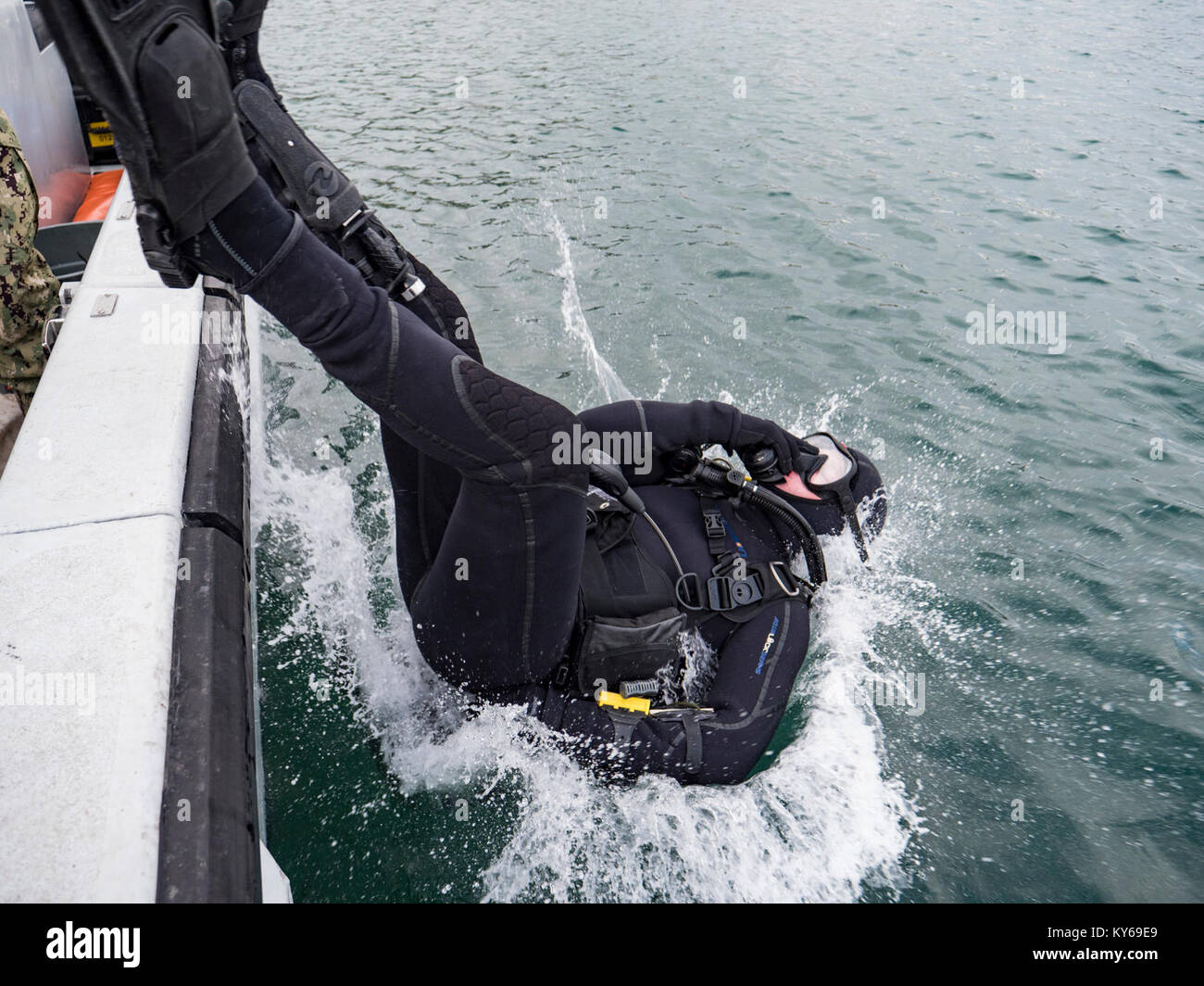 U.S. Navy Builder 2nd Class Aaron Brown, assigned to Underwater ...