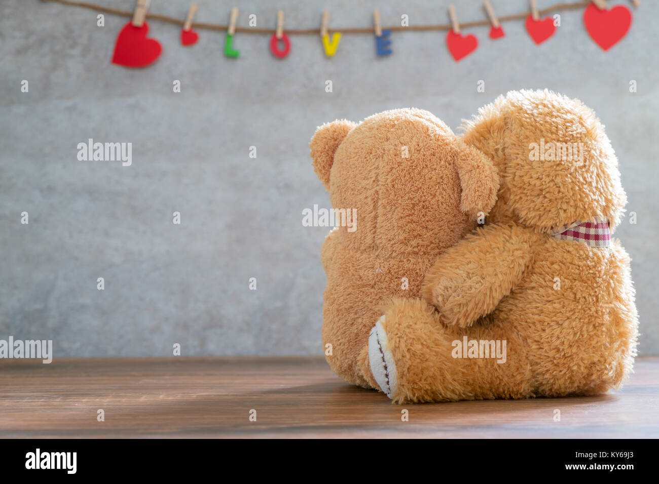 Two Teddy Bears Holding Hands