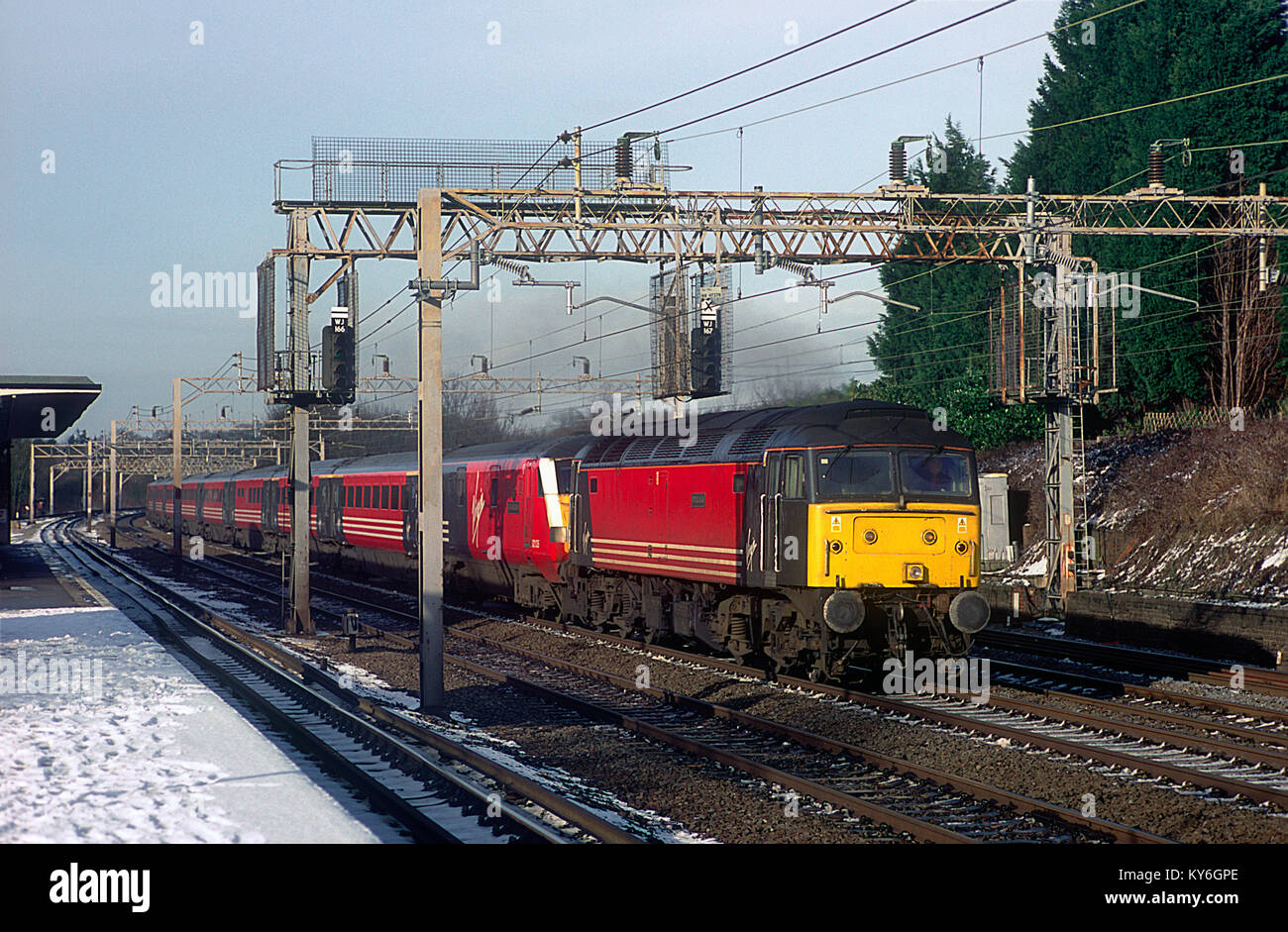 A class 47 diesel locomotive number 47843 'Vulcan' piloting a failed ...