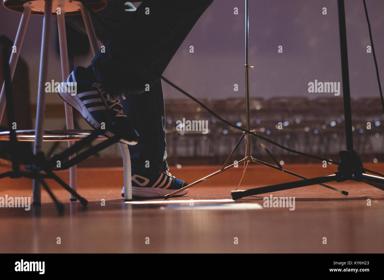 Feet of muscian while singing a song Stock Photo - Alamy