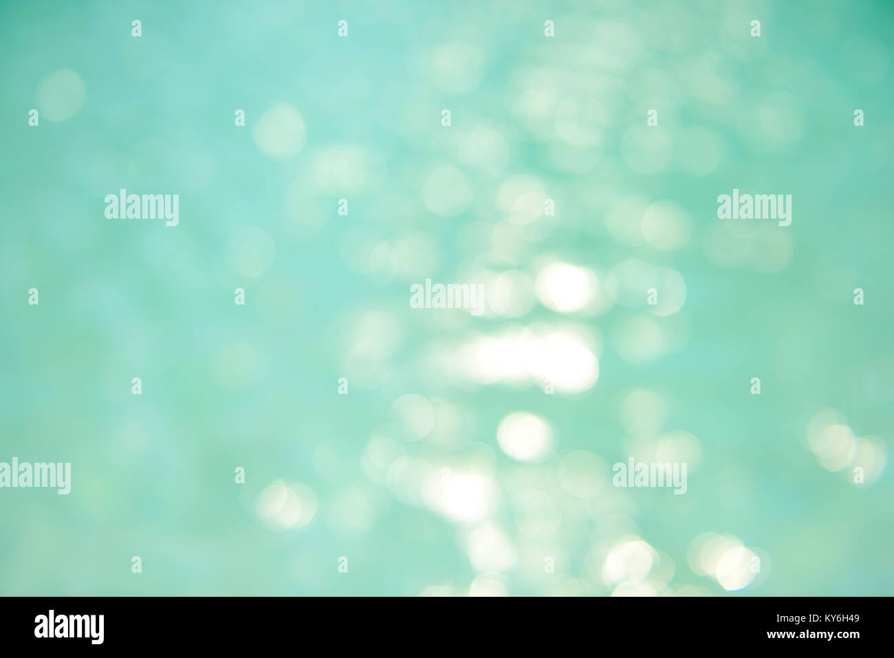 Soft focus bokeh light effects over a rippled, blue water background in the pool Stock Photo - Alamy