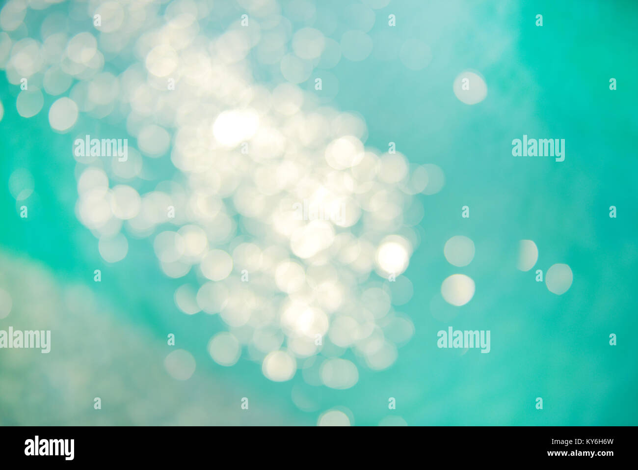 Soft focus bokeh light effects over a rippled, blue water background in the pool Stock Photo - Alamy
