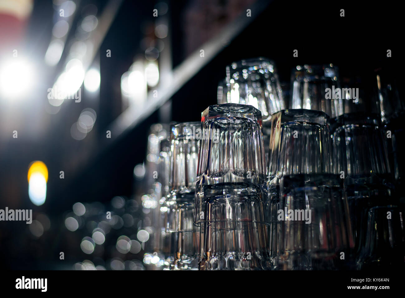 Empty glasses on table in club or restaurant, closeup Stock Photo - Alamy